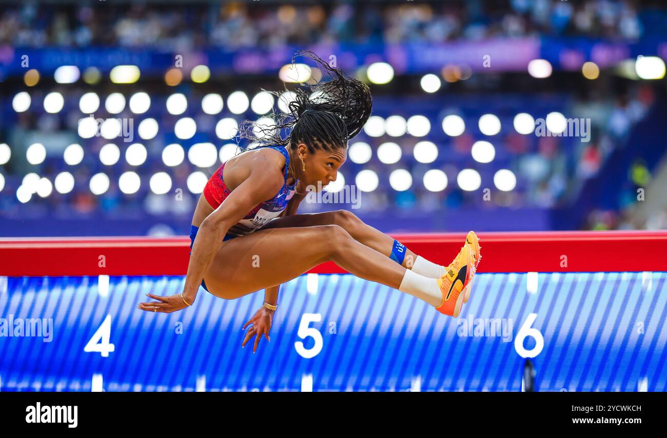 Tara Davis-Woodhall participating in the long jump at the Paris 2024 ...