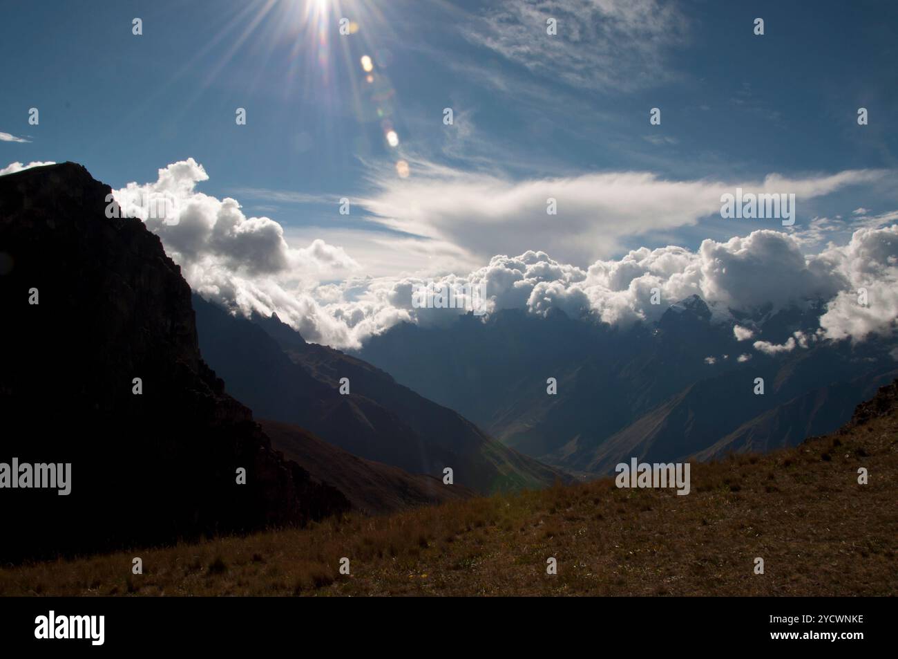 Andes Mountains Peru clouds and sunbeams in high altitude, rugged ...