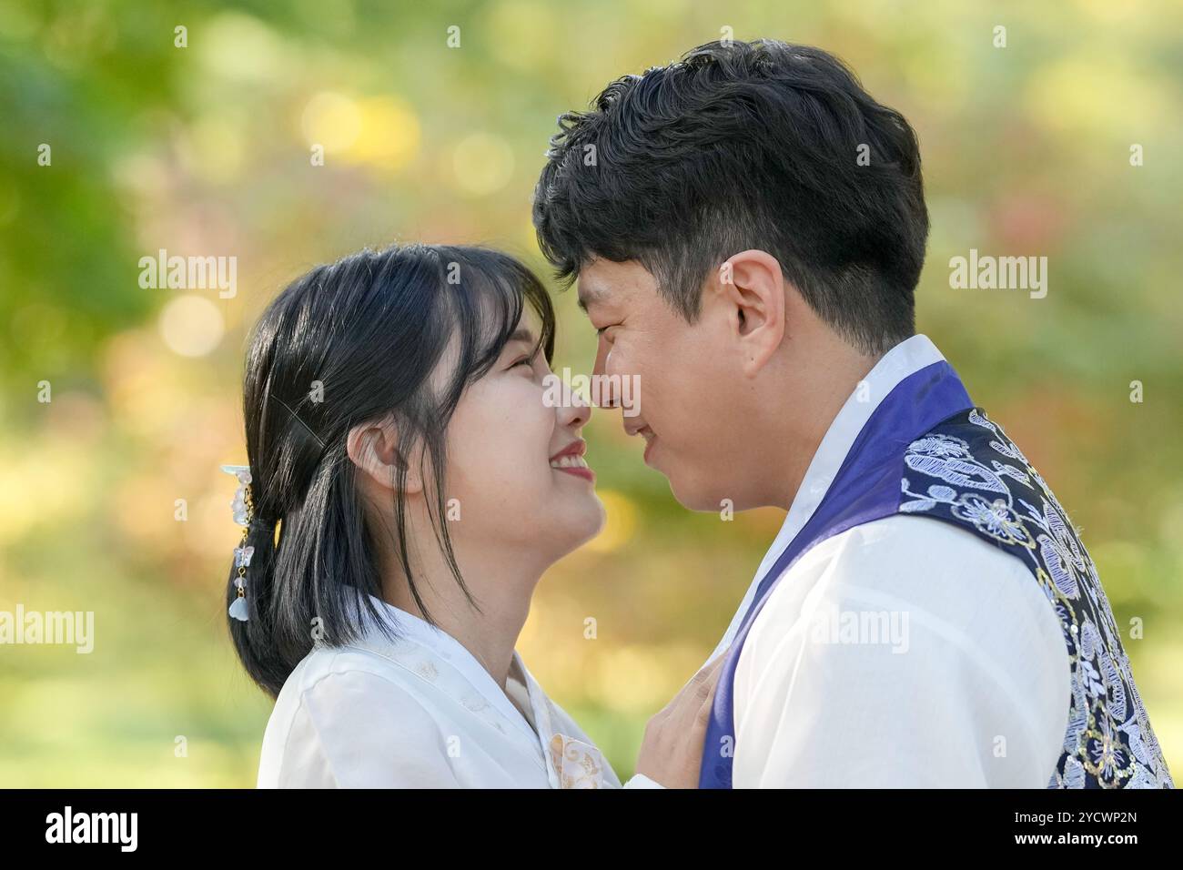 A Korean couple, a man in his 30s and a woman in her 20s, are spending ...