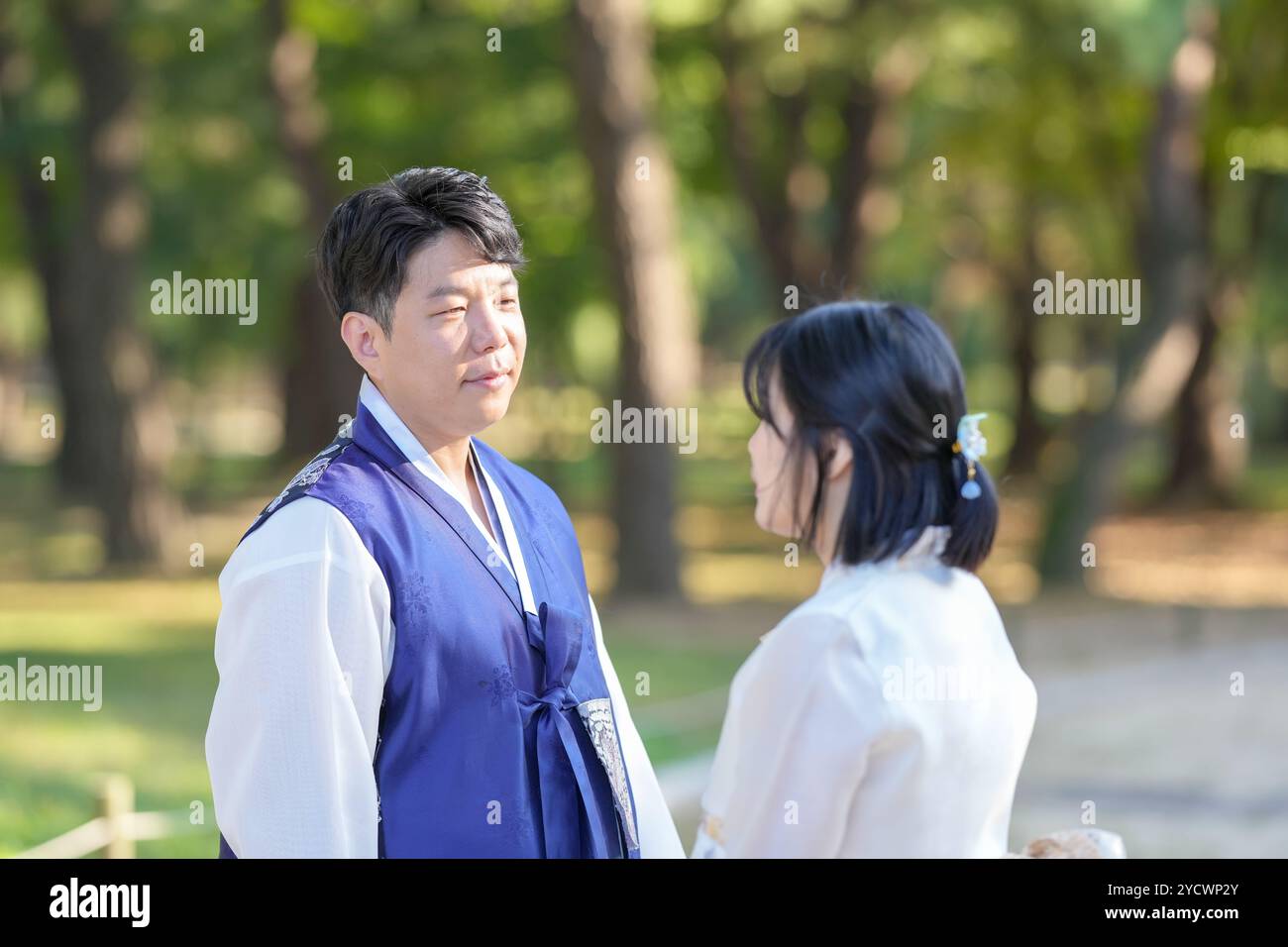 A Korean couple, a man in his 30s and a woman in her 20s, are spending ...