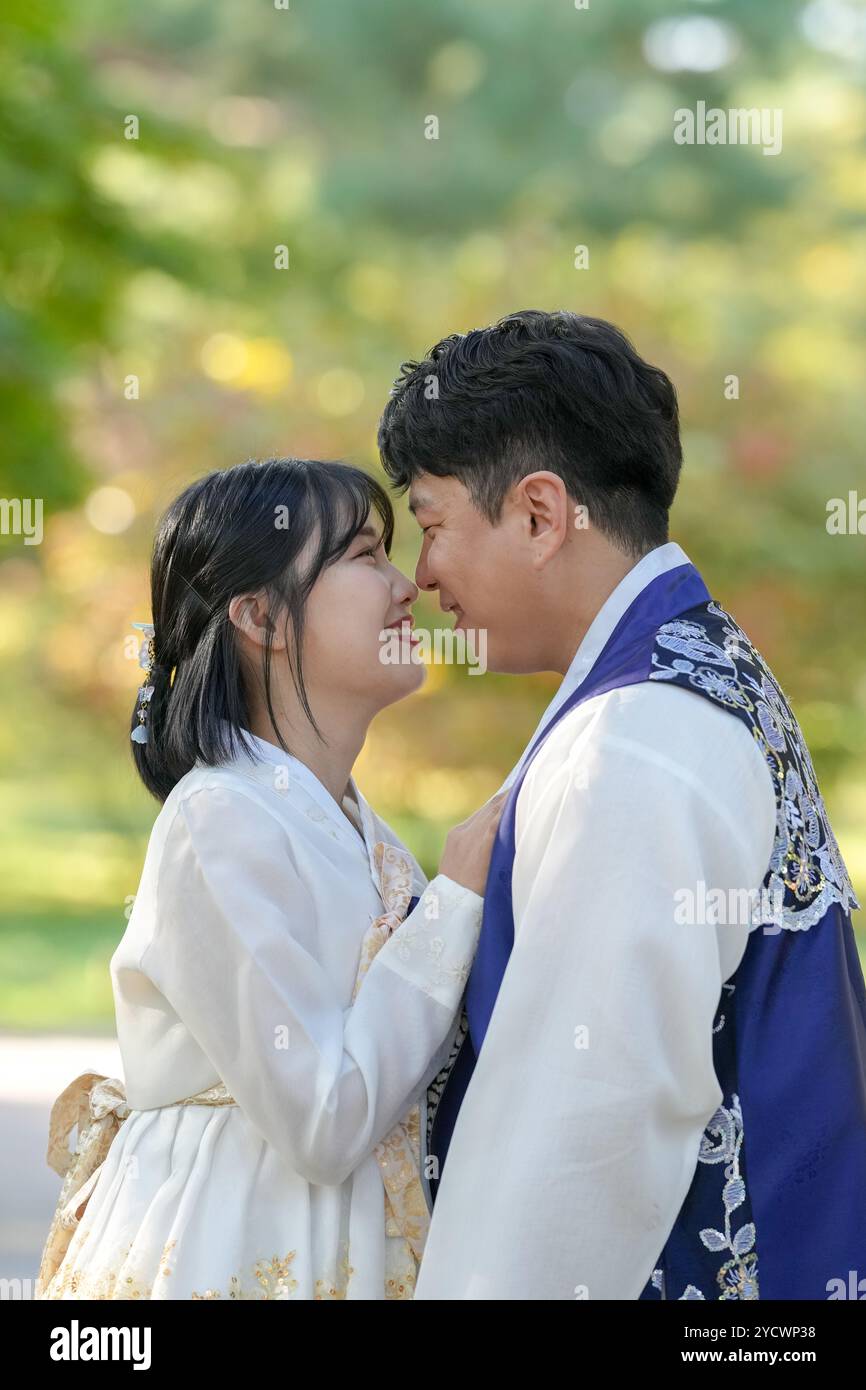 A Korean couple, a man in his 30s and a woman in her 20s, are spending ...