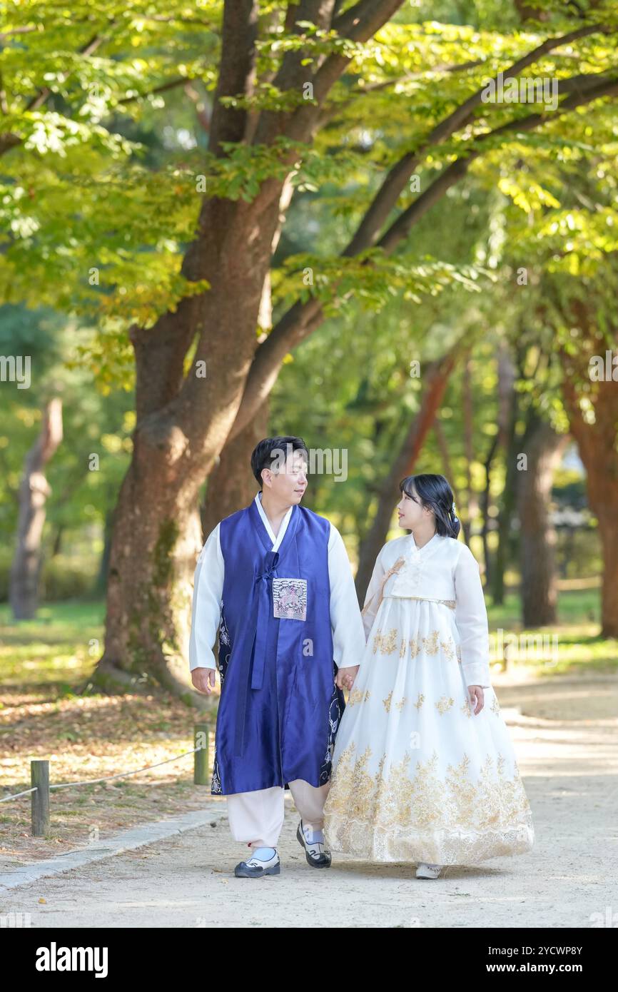 A Korean couple, a man in his 30s and a woman in her 20s, are spending ...
