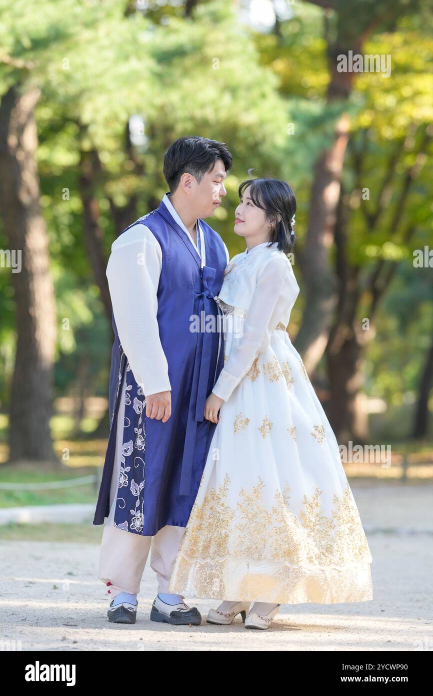 A Korean couple, a man in his 30s and a woman in her 20s, are spending ...