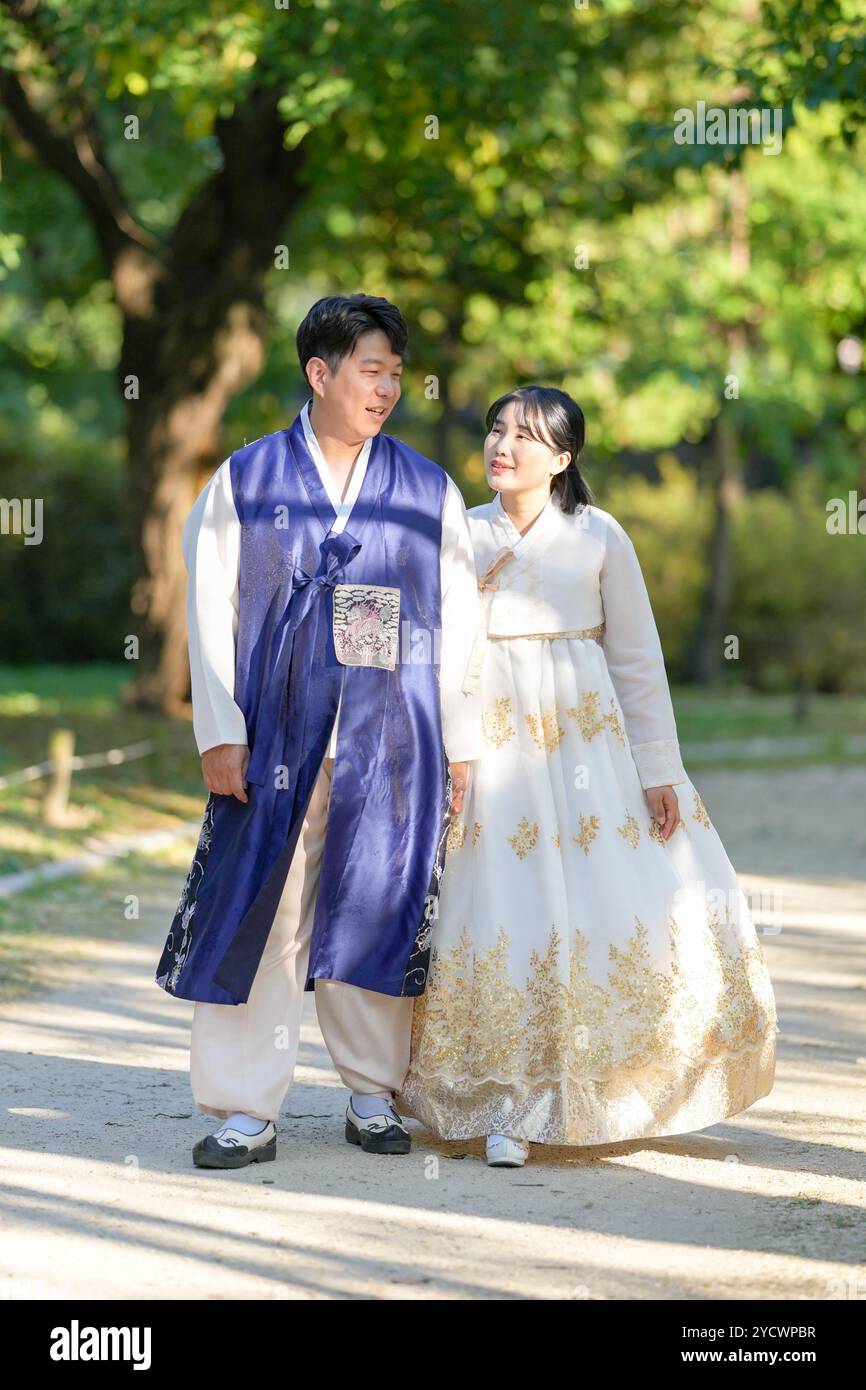 A Korean couple, a man in his 30s and a woman in her 20s, are spending ...