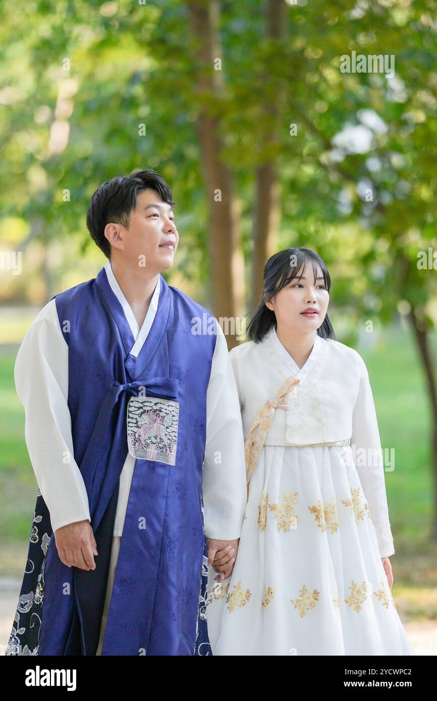 A Korean couple, a man in his 30s and a woman in her 20s, are spending ...