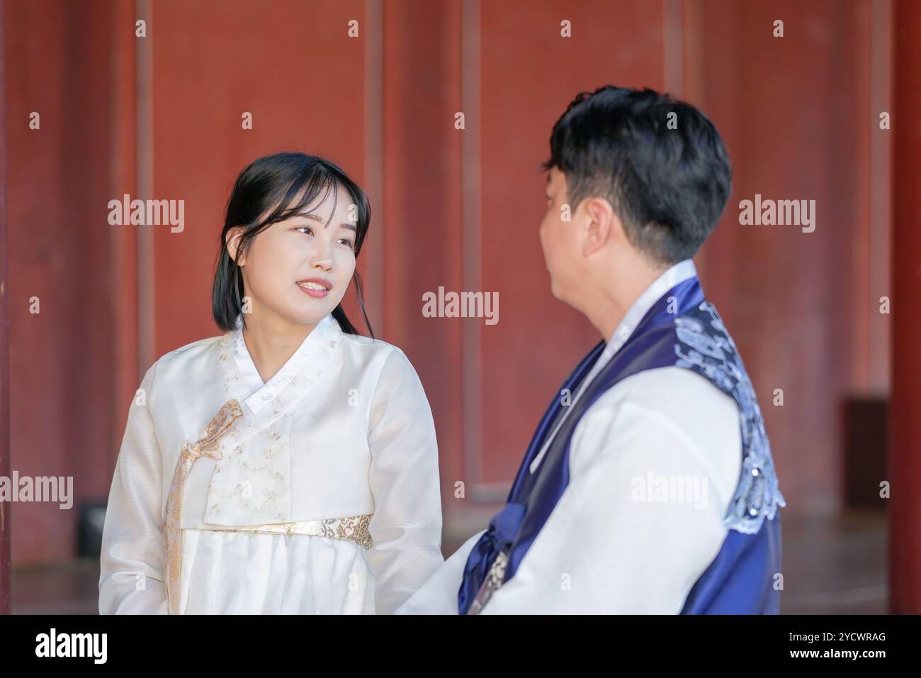 A Korean couple, a man in his 30s and a woman in her 20s, are happily ...