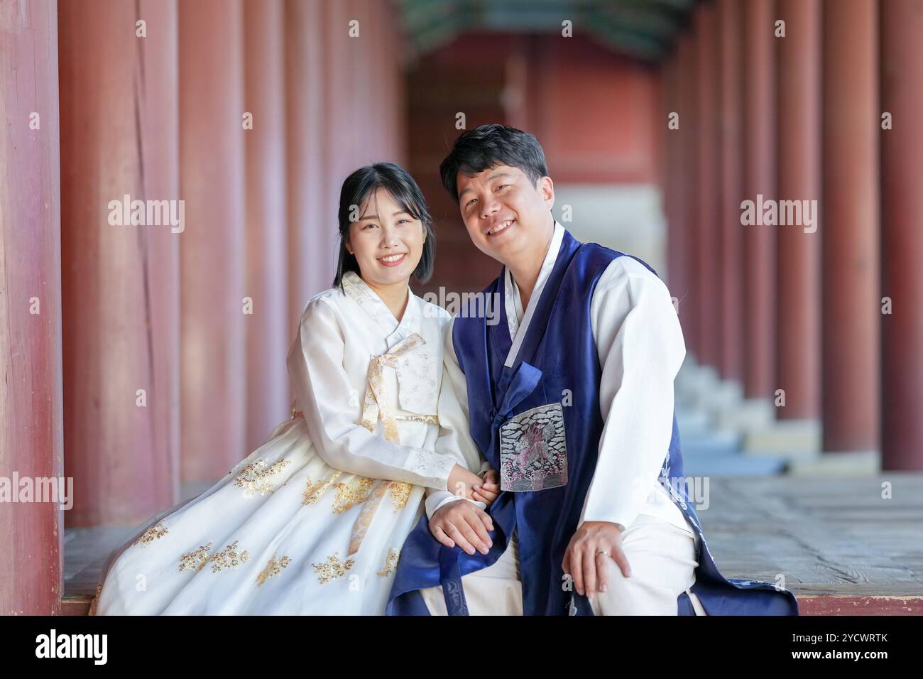 A Korean couple, a man in his 30s and a woman in her 20s, are happily ...