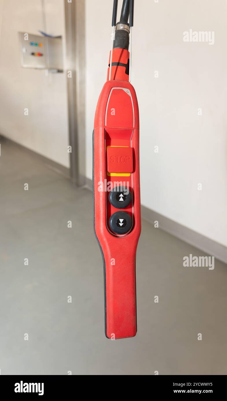 crane red remote control in a factory, indoors clean background Stock ...