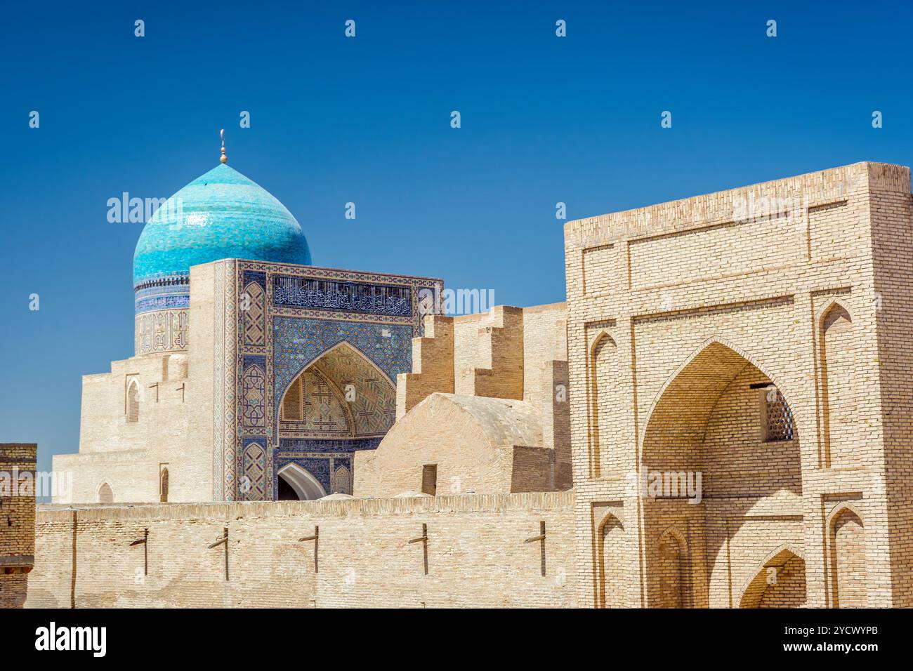 Kalyan mosque and wall, Bukhara Stock Photo - Alamy