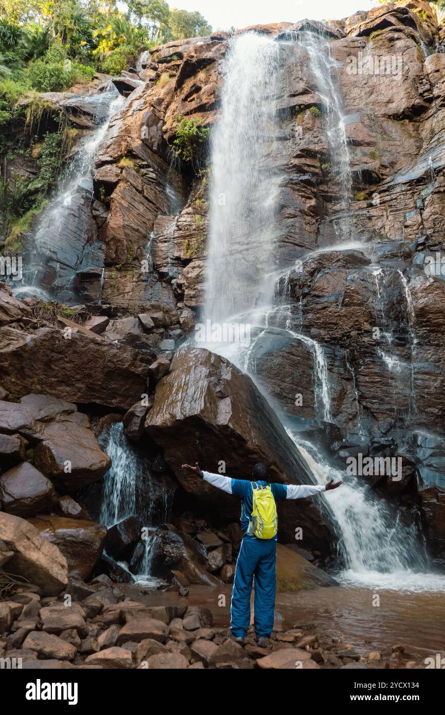 vew of a hiker at Kisasa Waterfalls in Usambara Mountains, Magamba ...