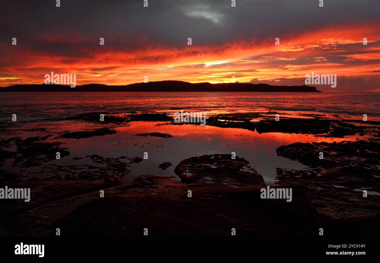 Magnificent red dawn the sky aglow in fiery colours and thus adorns the ...
