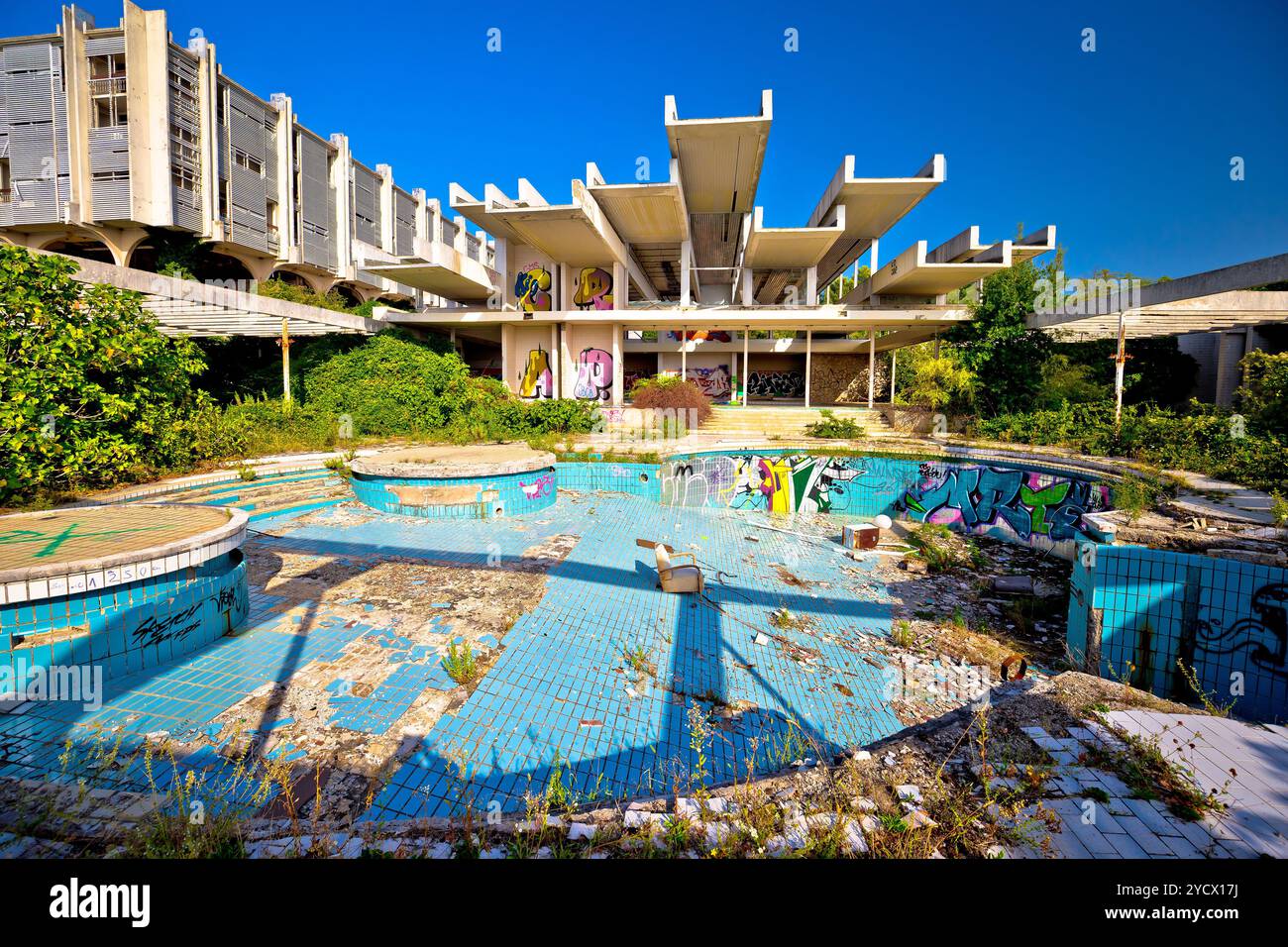 Abandoned and destructed luxury hotel exterior Stock Photo - Alamy