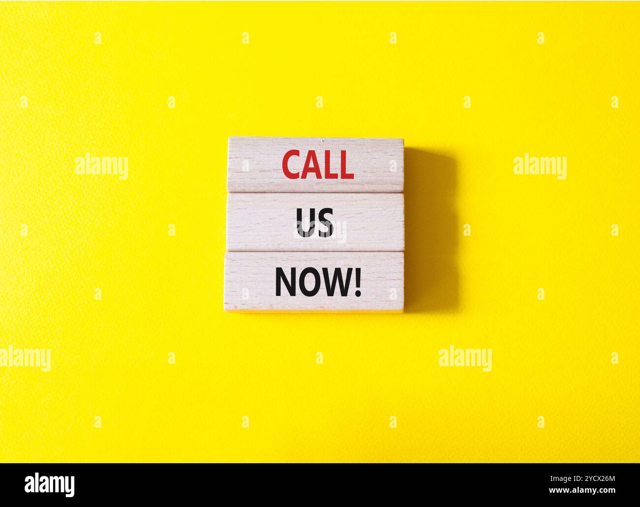 Call us now symbol. Wooden blocks with words Call us now. Beautiful ...