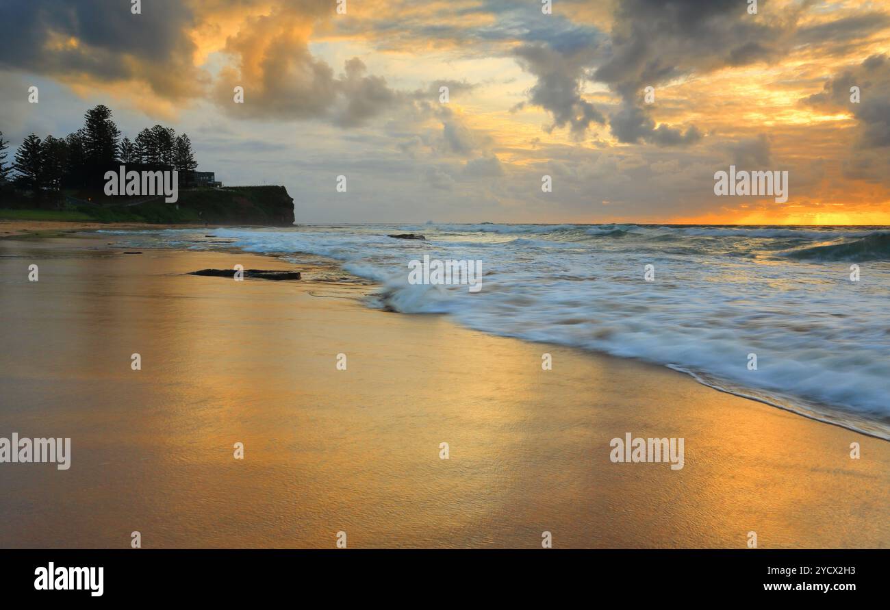 Little Austinmer Beach sunrise Stock Photo - Alamy