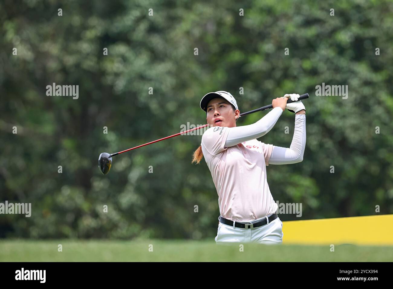 KUALA LUMPUR, - OCTOBER 24: Atthaya 'Jeeno' Thitikul of Thailand play a ...