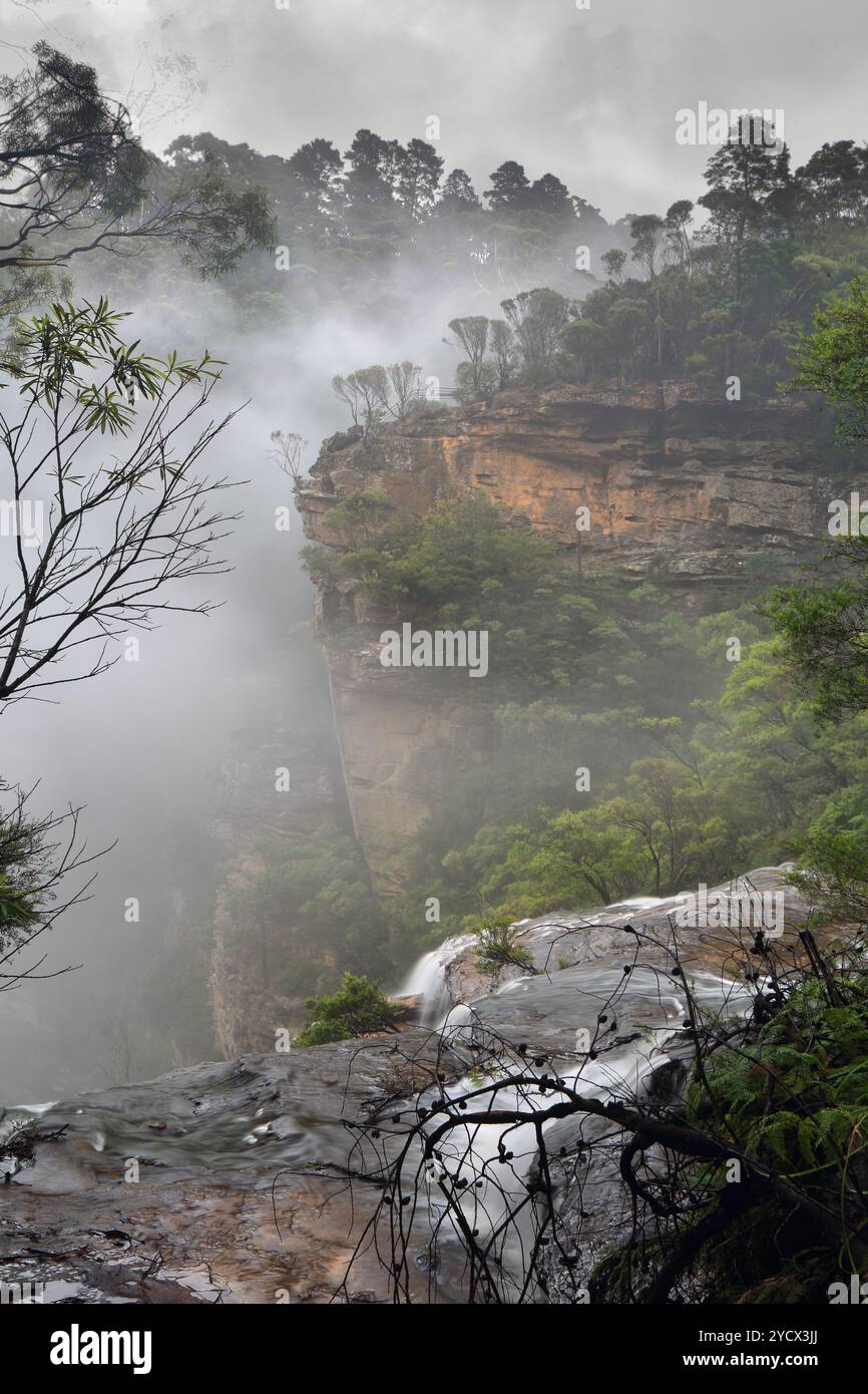 Views of the water as it passes over the ledge before the large drop ...