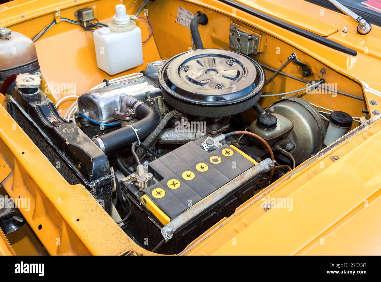 Car engine of old soviet vehicle Moskvich-412, under the hood of a ...