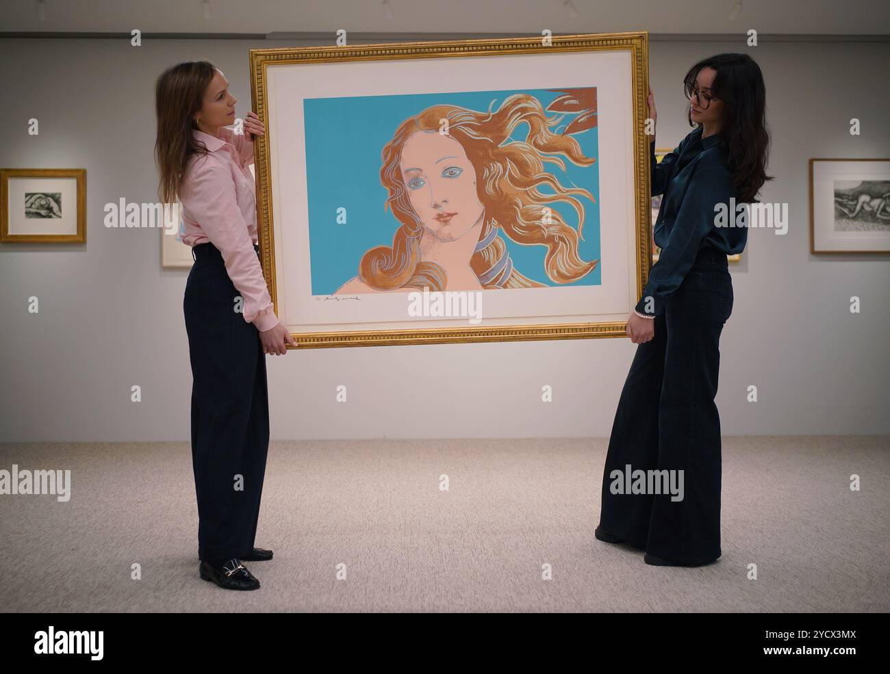 Members of gallery staff holding a piece by Andy Warhol, Details of ...
