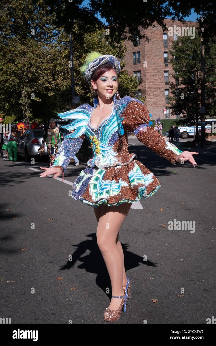 An attractive dancer from the San Simon troupe dances before the ...