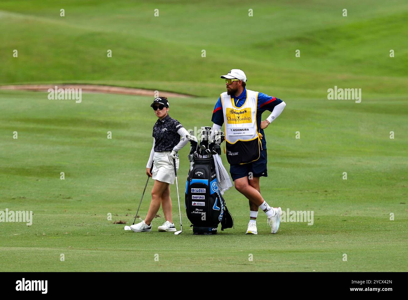 KUALA LUMPUR, - OCTOBER 24: Yuna Nishimura of Japan await with her ...