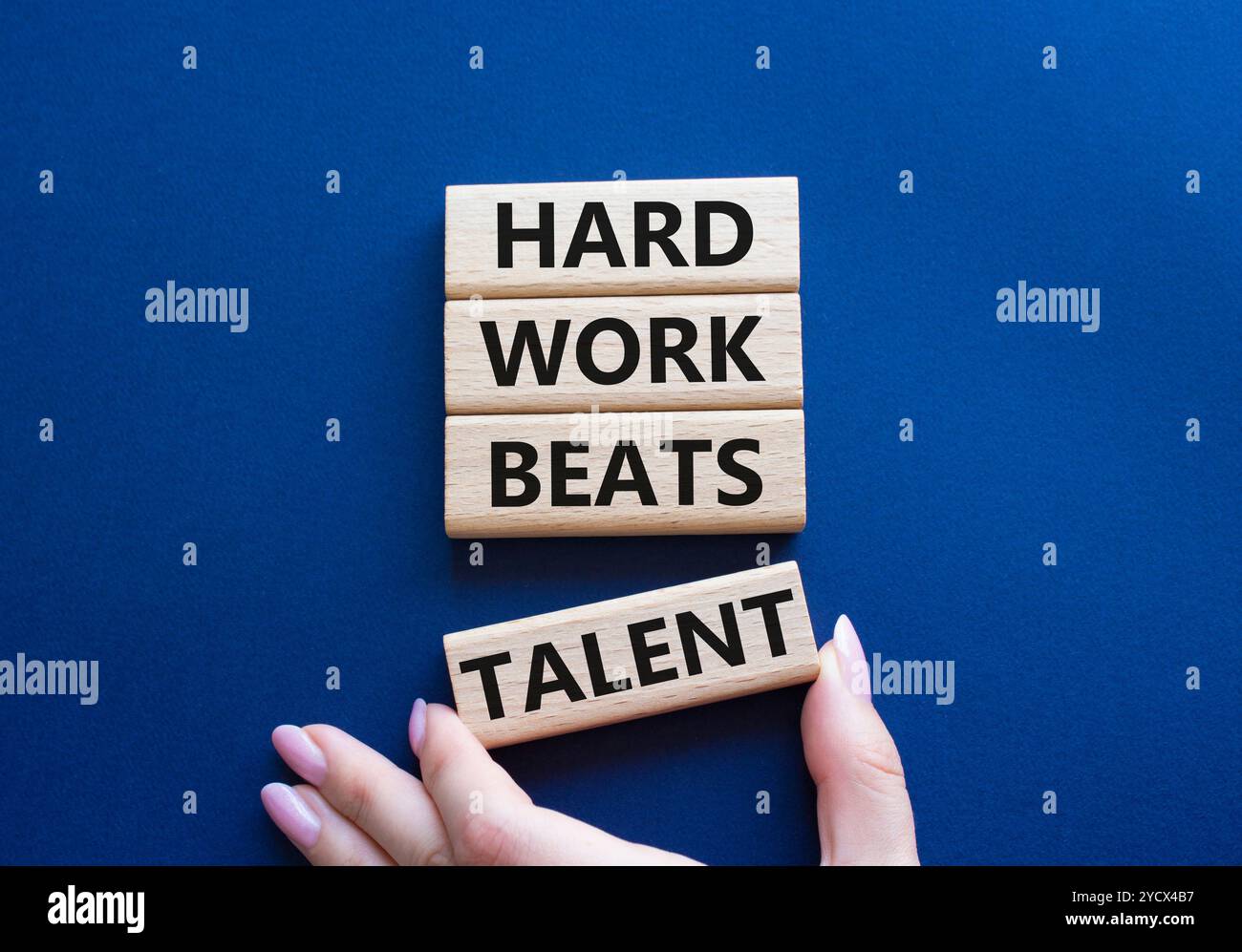 Talent symbol. Concept words Hard work beats talent on wooden blocks ...