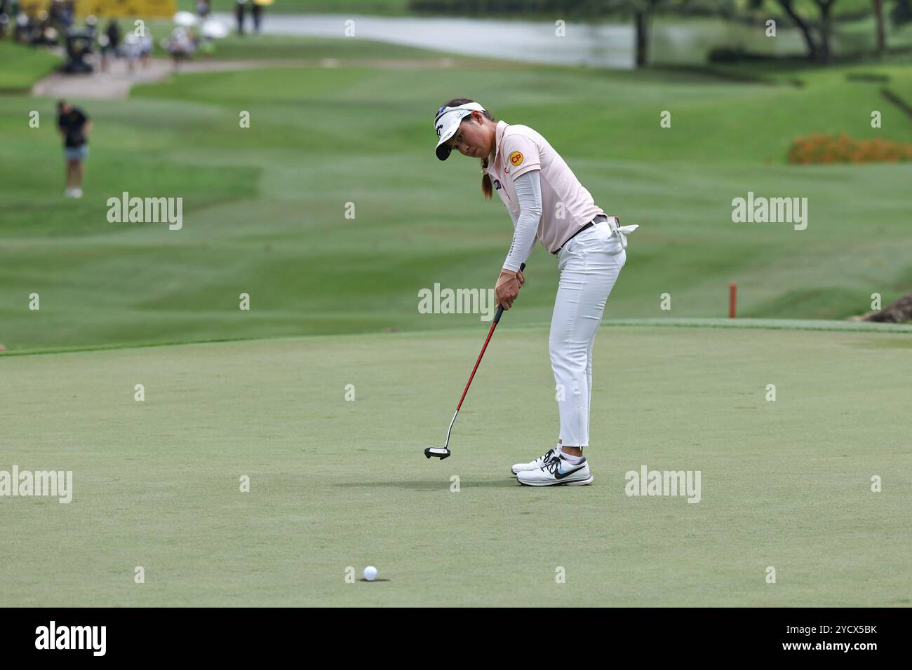 KUALA LUMPUR, - OCTOBER 24: Atthaya 'Jeeno' Thitikul of Thailand play a ...