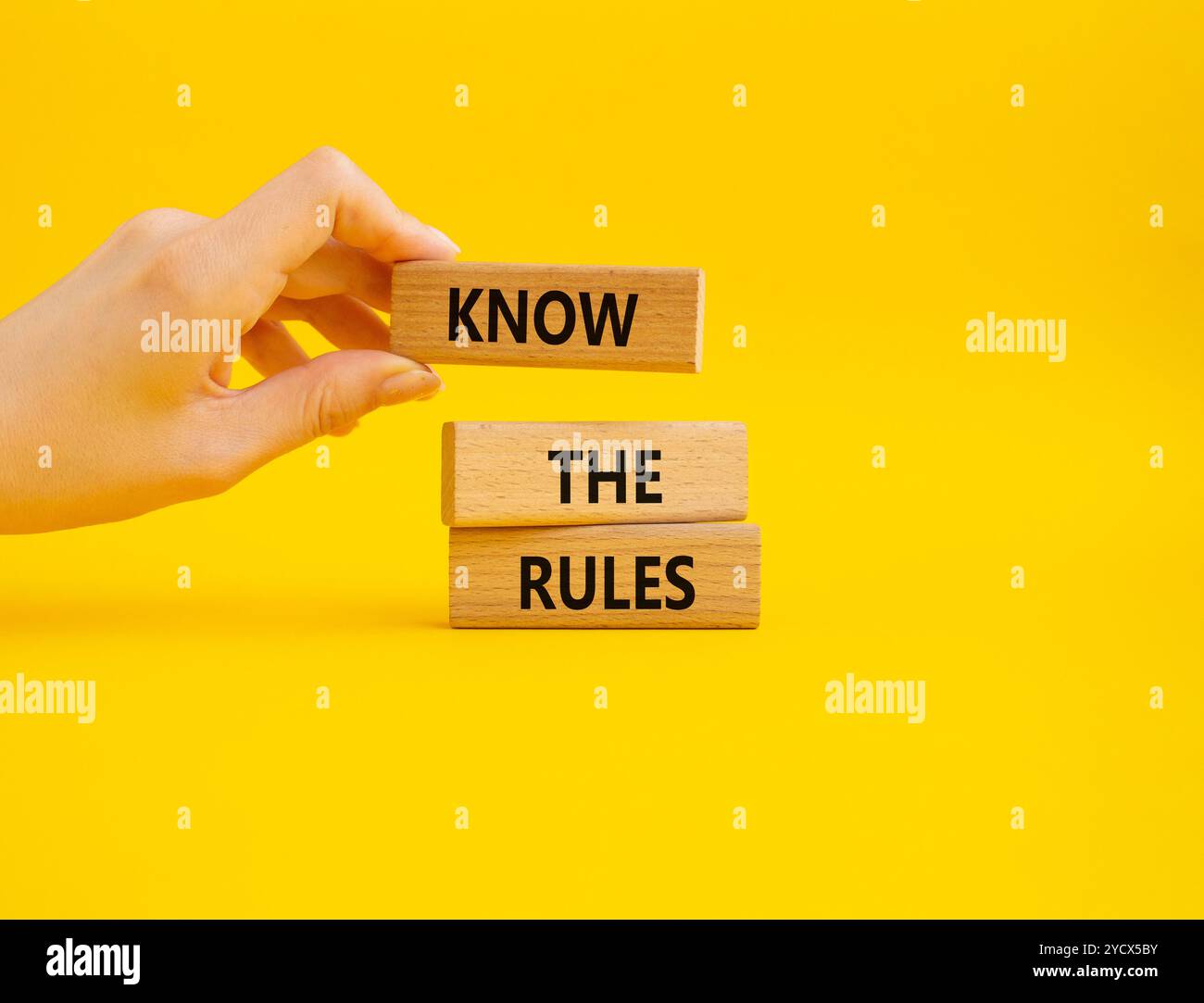 Know the rules symbol. Wooden blocks with words Know the rules ...