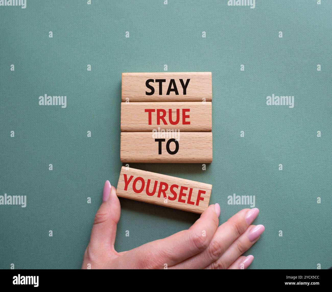 Stay True to Yourself symbol. Wooden blocks with words Stay True to ...