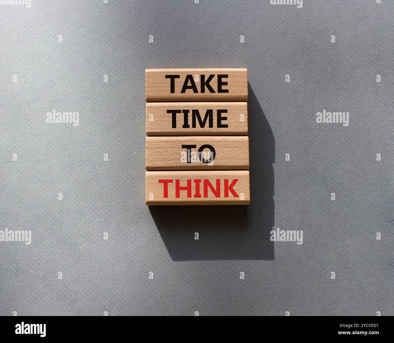 Take time to think symbol. Wooden blocks with words Take time to think ...