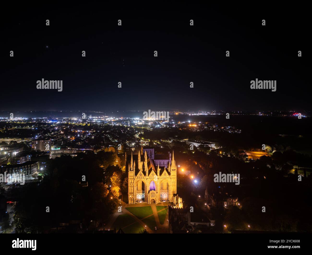 Peterborough cathedral glowing at night, an aerial view of the ...