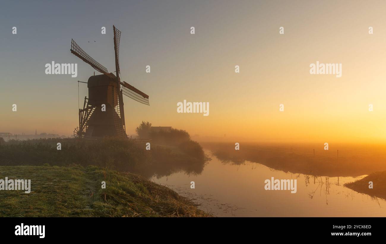 The low-lying mist combined with the warm colors of the rising sun ...