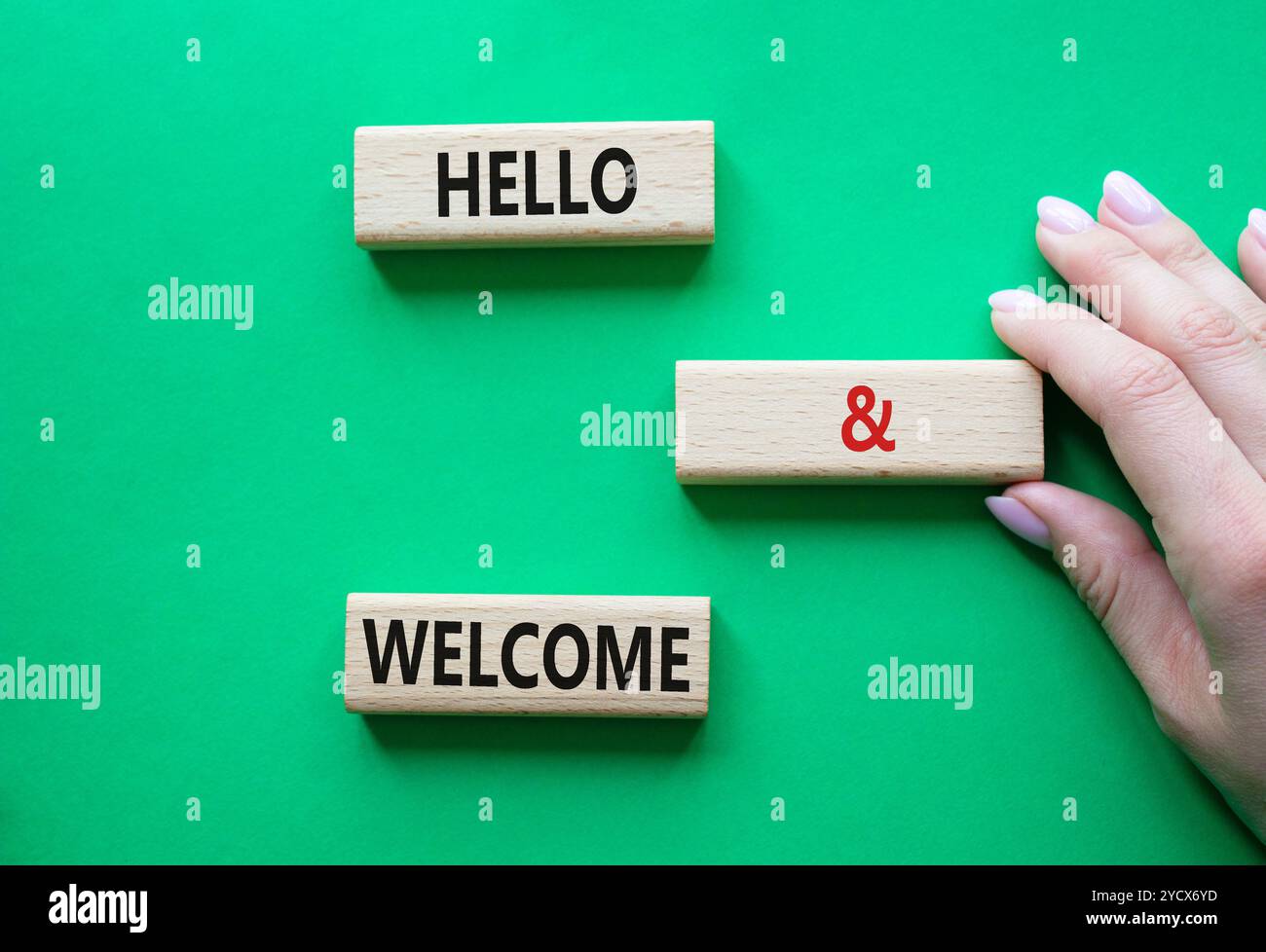 Hello and Welcome symbol. Concept words Hello and Welcome on wooden ...