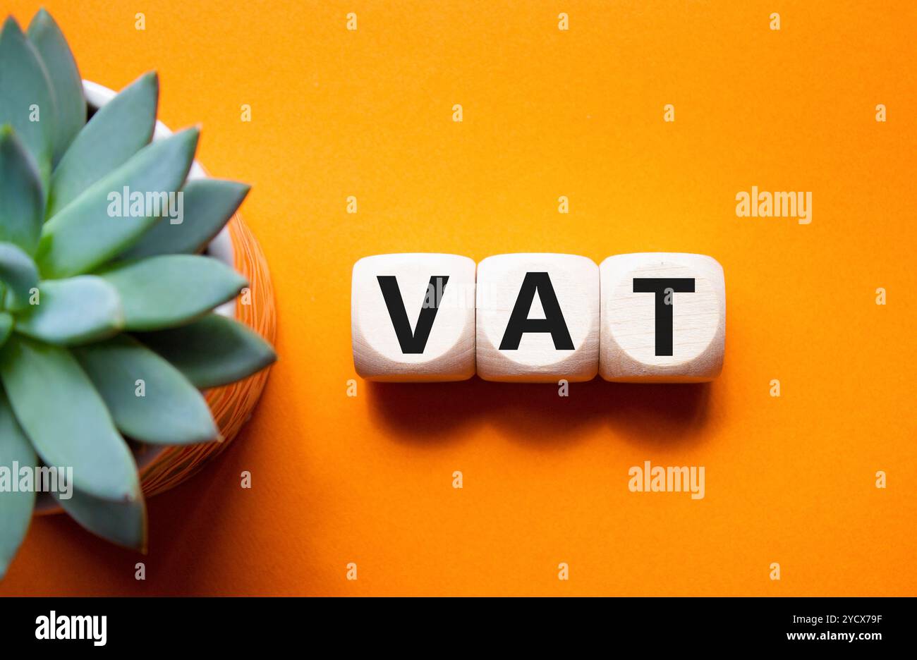 VAT - Value Added Tax symbol. Wooden cubes with word VAT. Beautiful ...