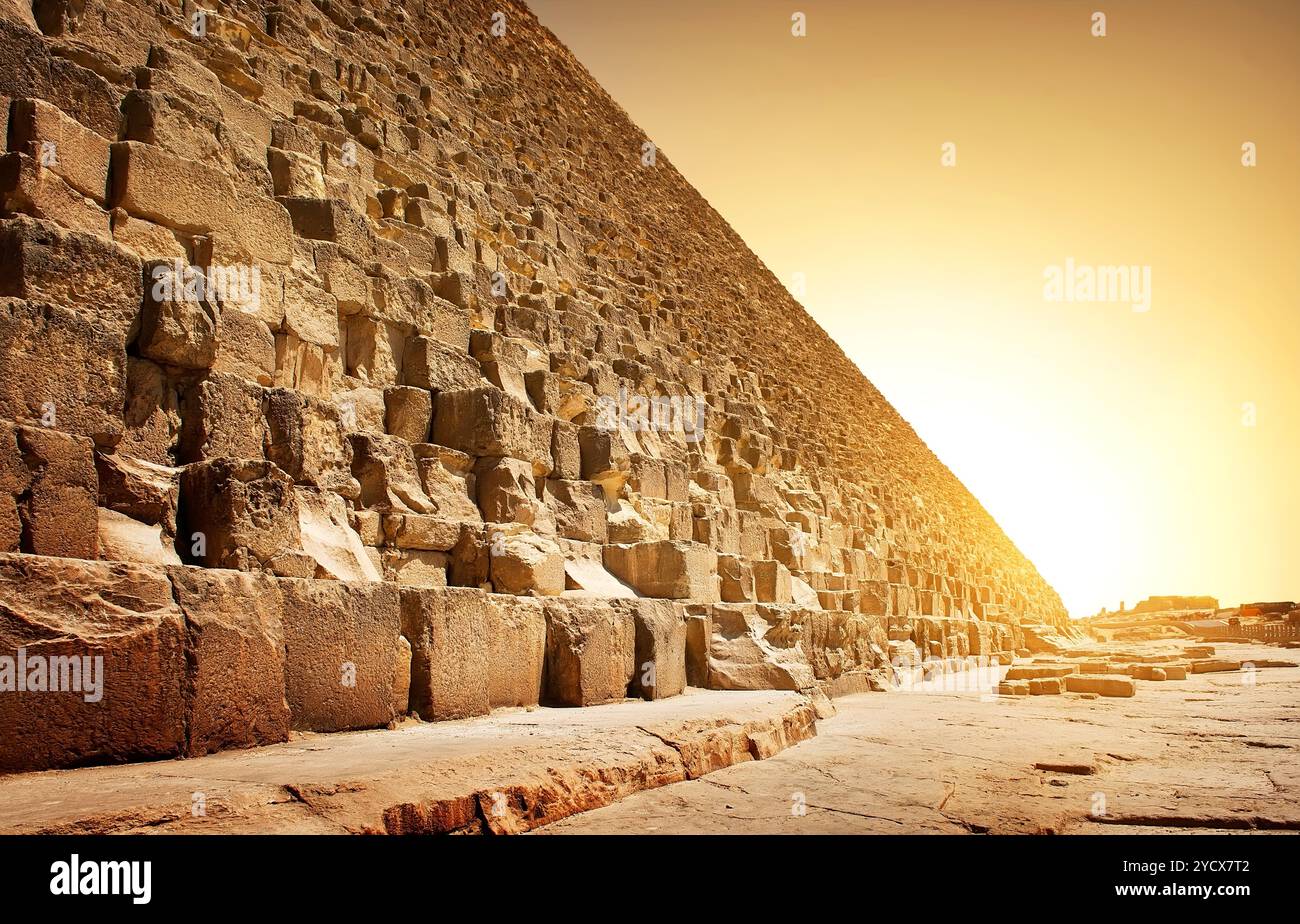 Fiery sunset and pyramid Stock Photo - Alamy