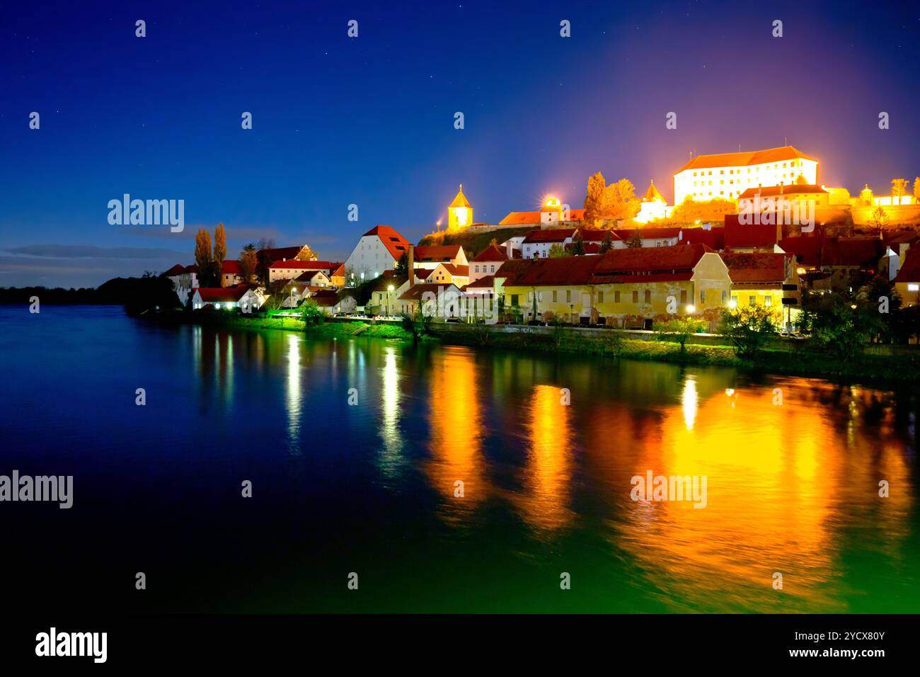 Town of Ptuj and Drava river evening riverfront view Stock Photo - Alamy