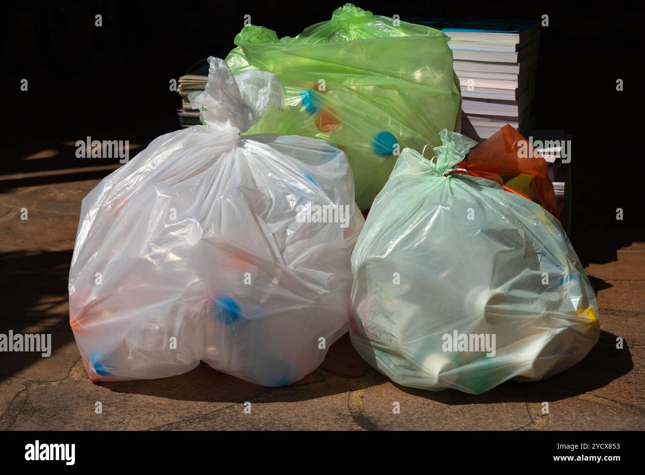 A close-up image of multiple plastic bags filled with various ...