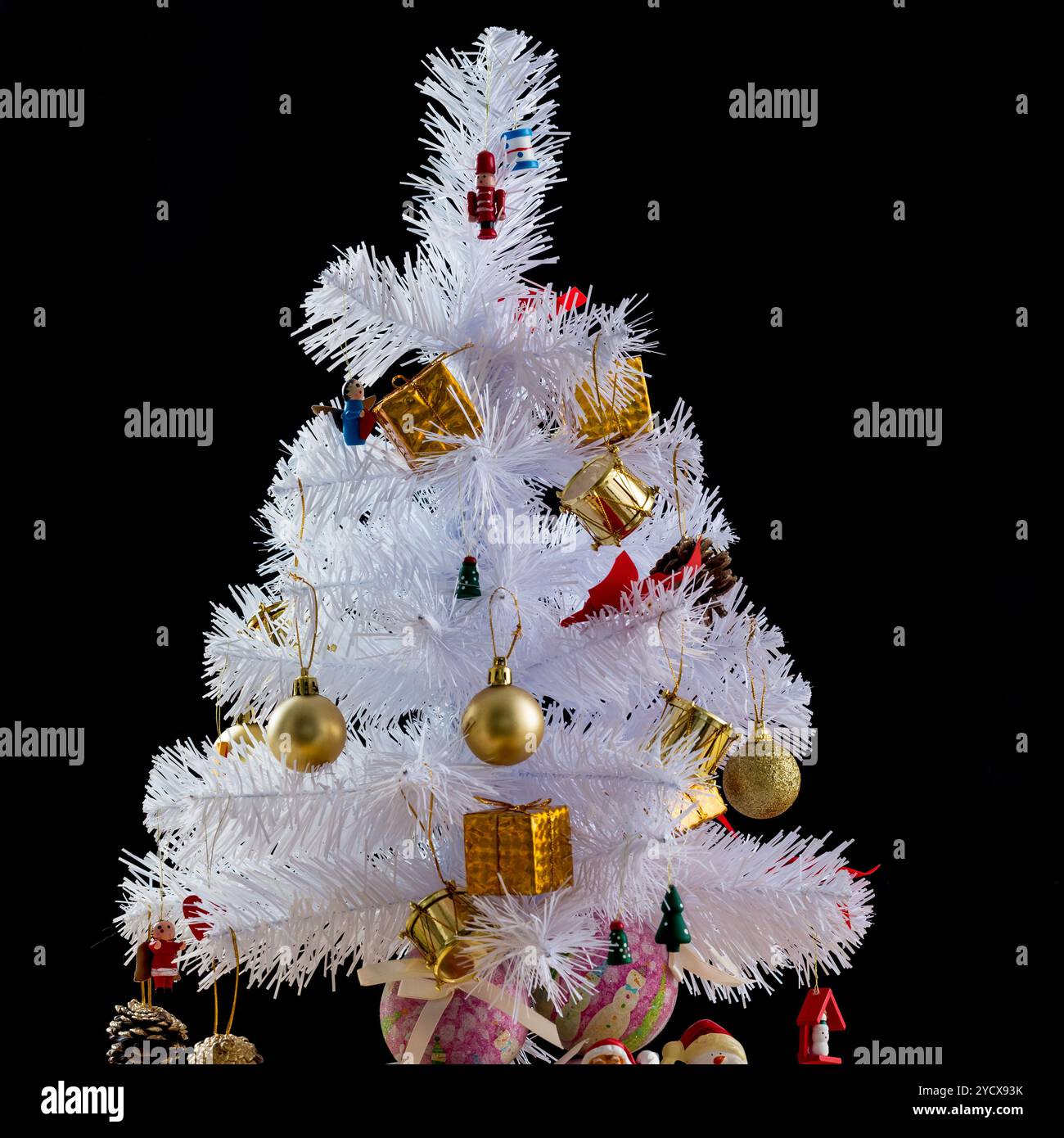 Small Christmas tree sitting on top of stool in a minimal room Stock ...
