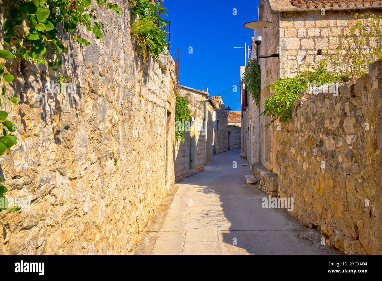 Old narrow stone street of Vis view Stock Photo - Alamy
