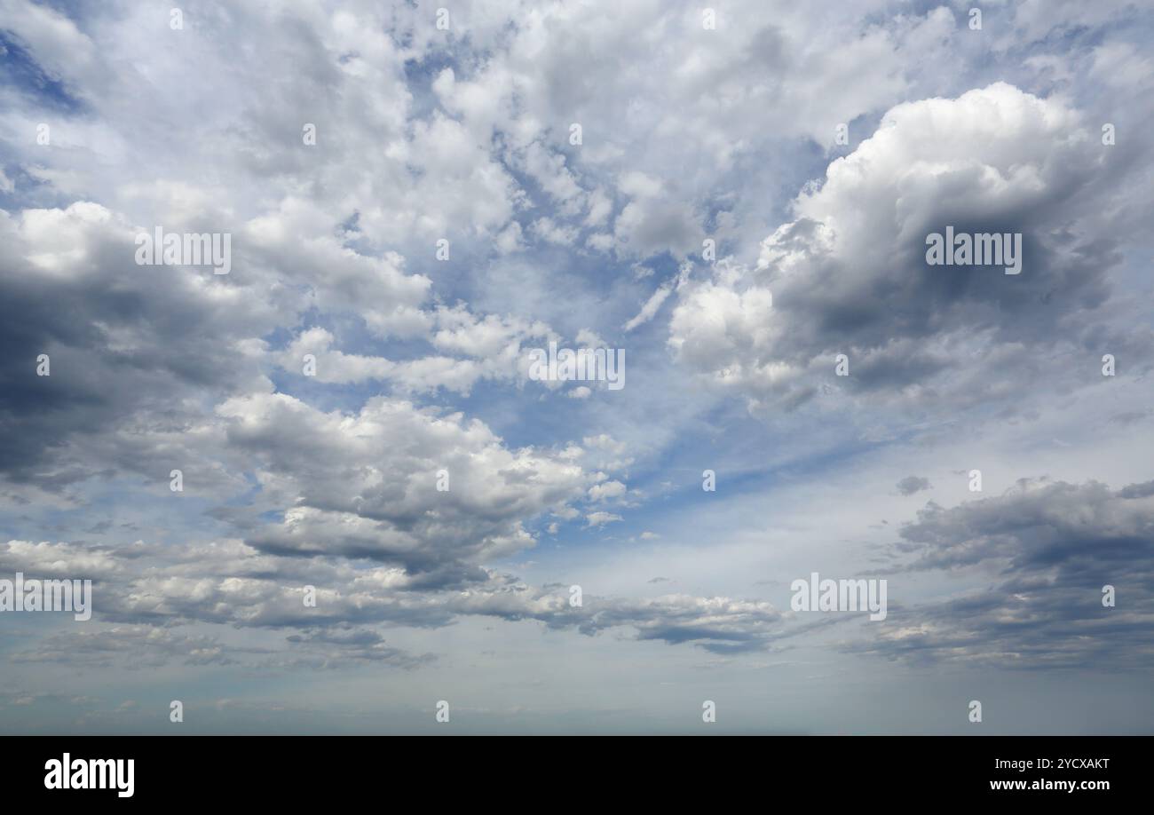 Sheer high cloud mixed with heavy darker clouds with blue sky Stock ...