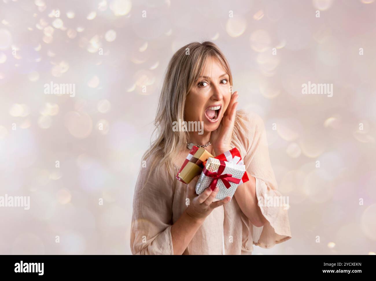 Woman christmas gifts hi-res stock photography and images - Alamy