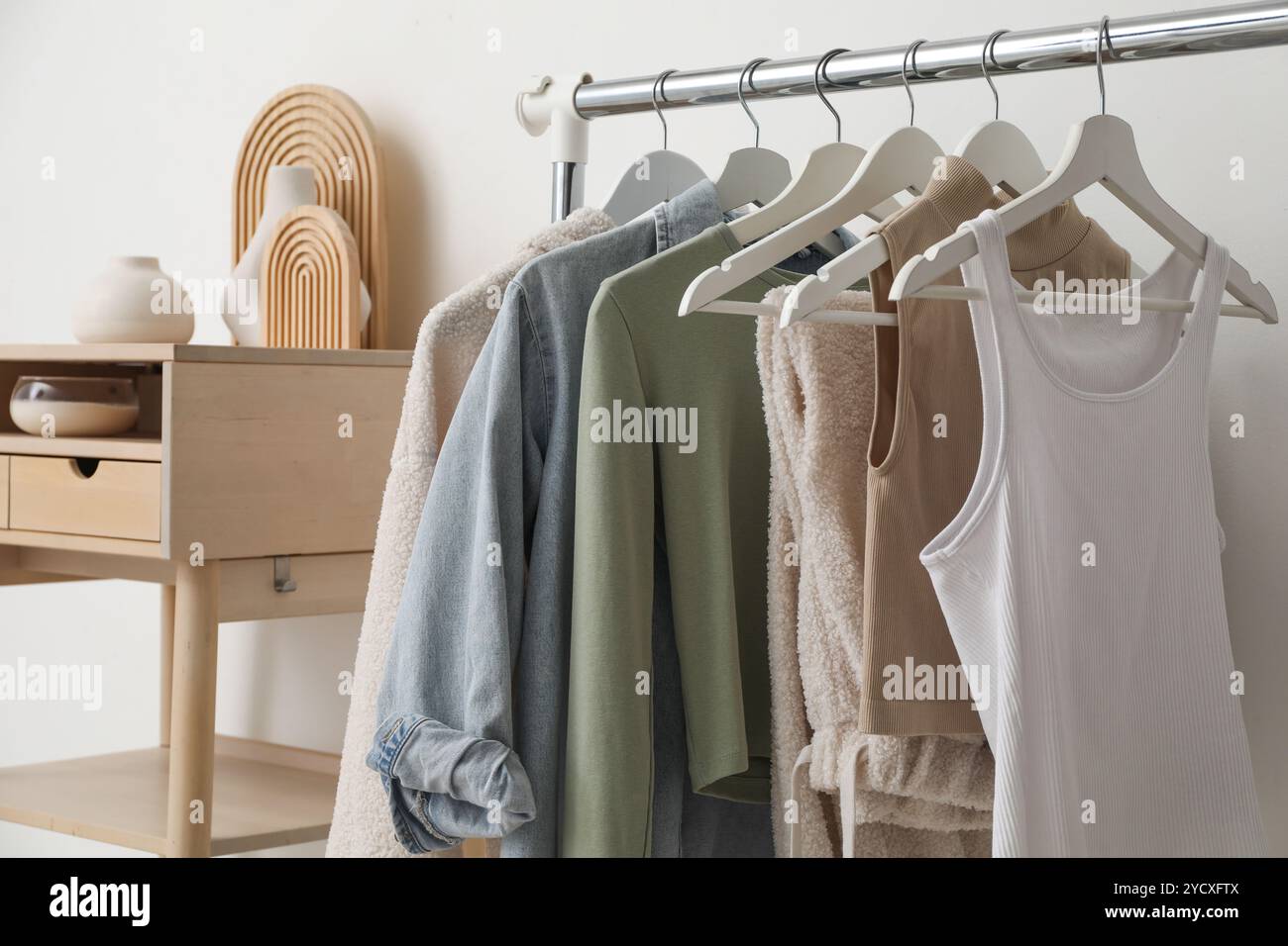 Woman standing near wardrobe hi-res stock photography and images - Alamy