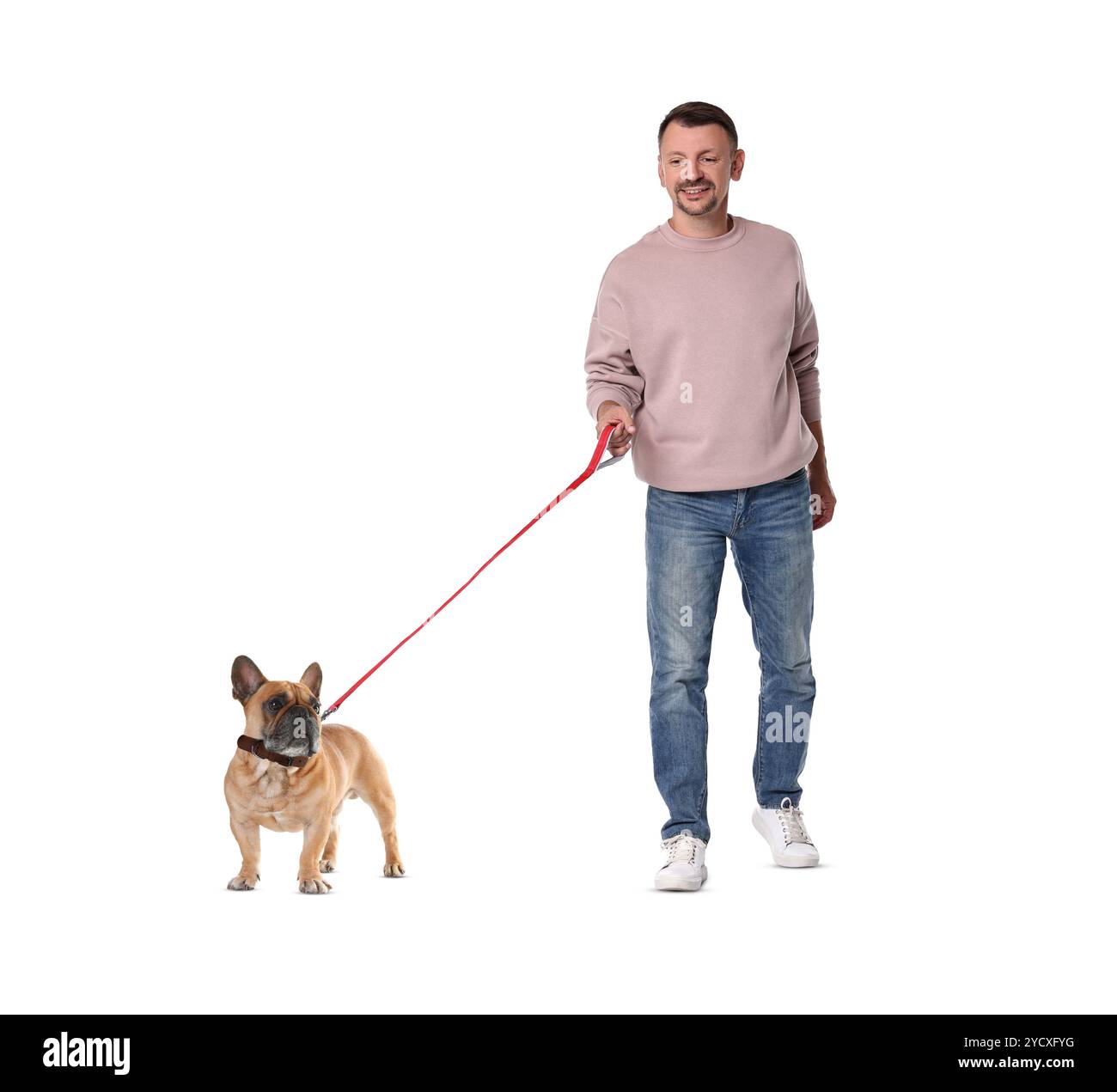 Happy man walking his dog on white background Stock Photo - Alamy