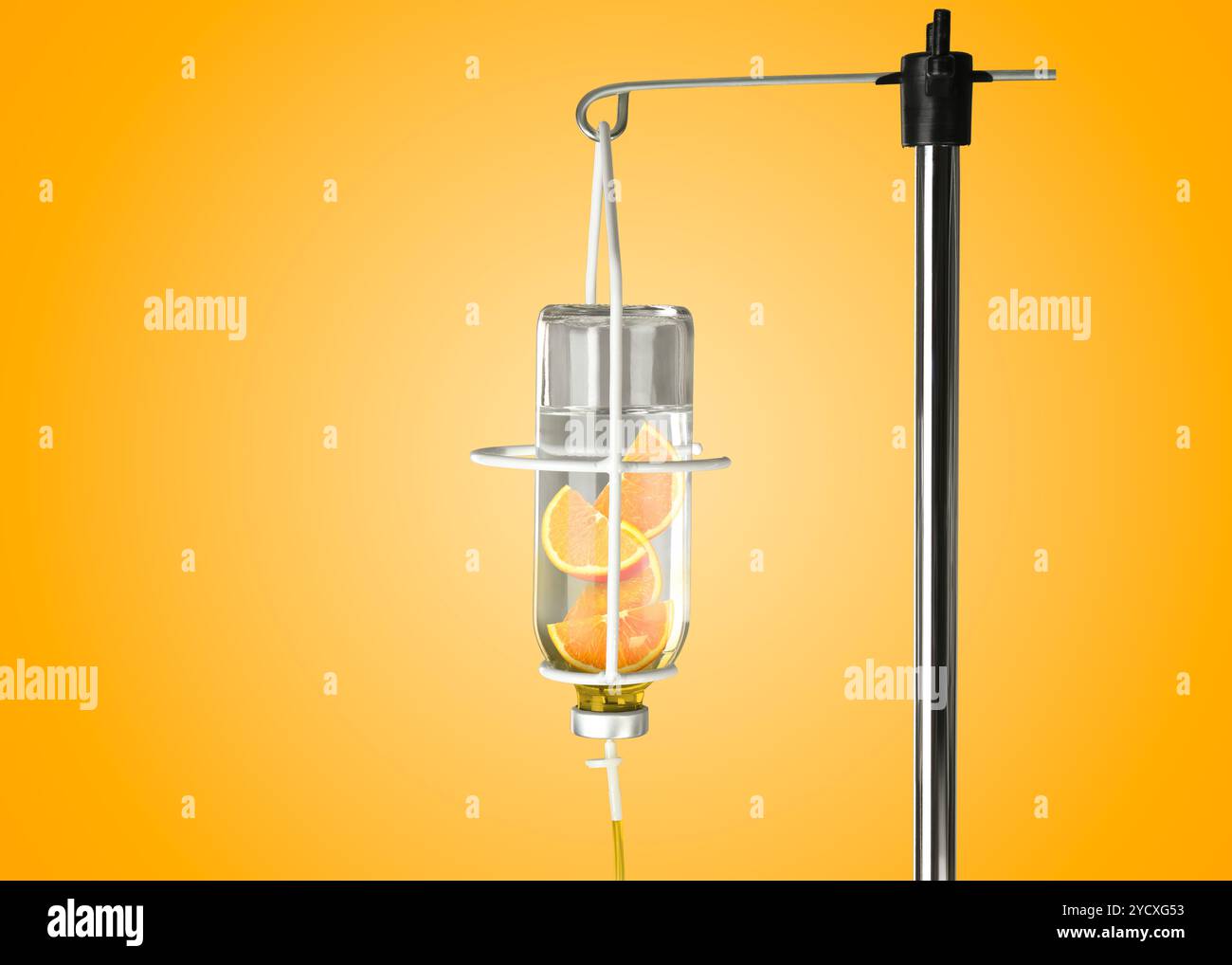 Vitamin intravenous therapy. IV infusion set on orange background ...