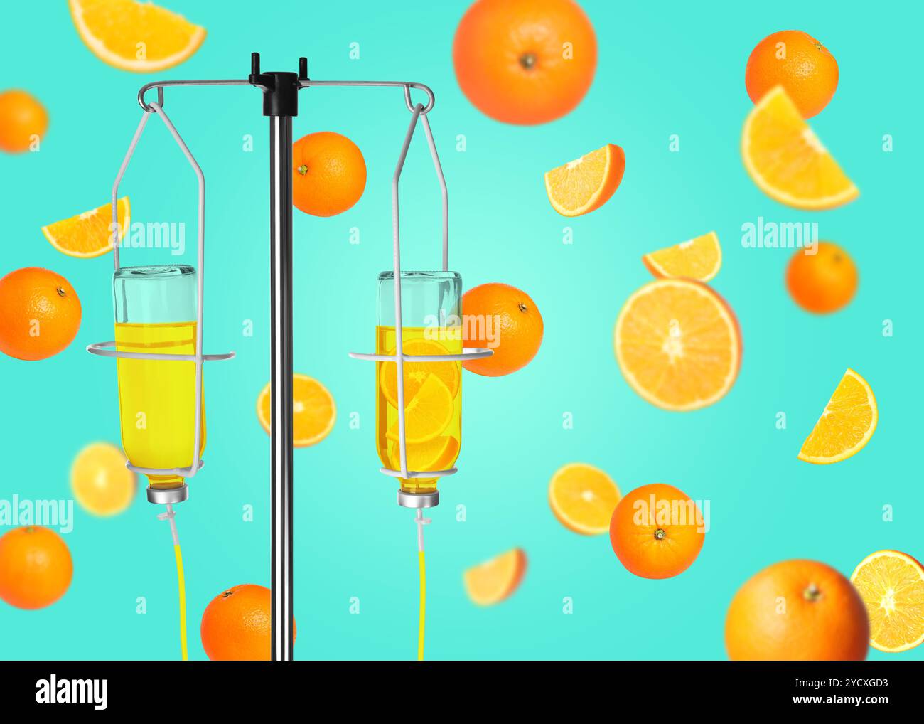 Vitamin intravenous therapy. IV infusion set and falling oranges on ...