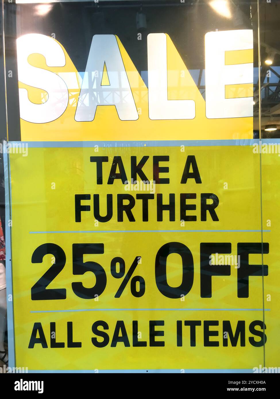 Sale sign in shop window Stock Photo - Alamy
