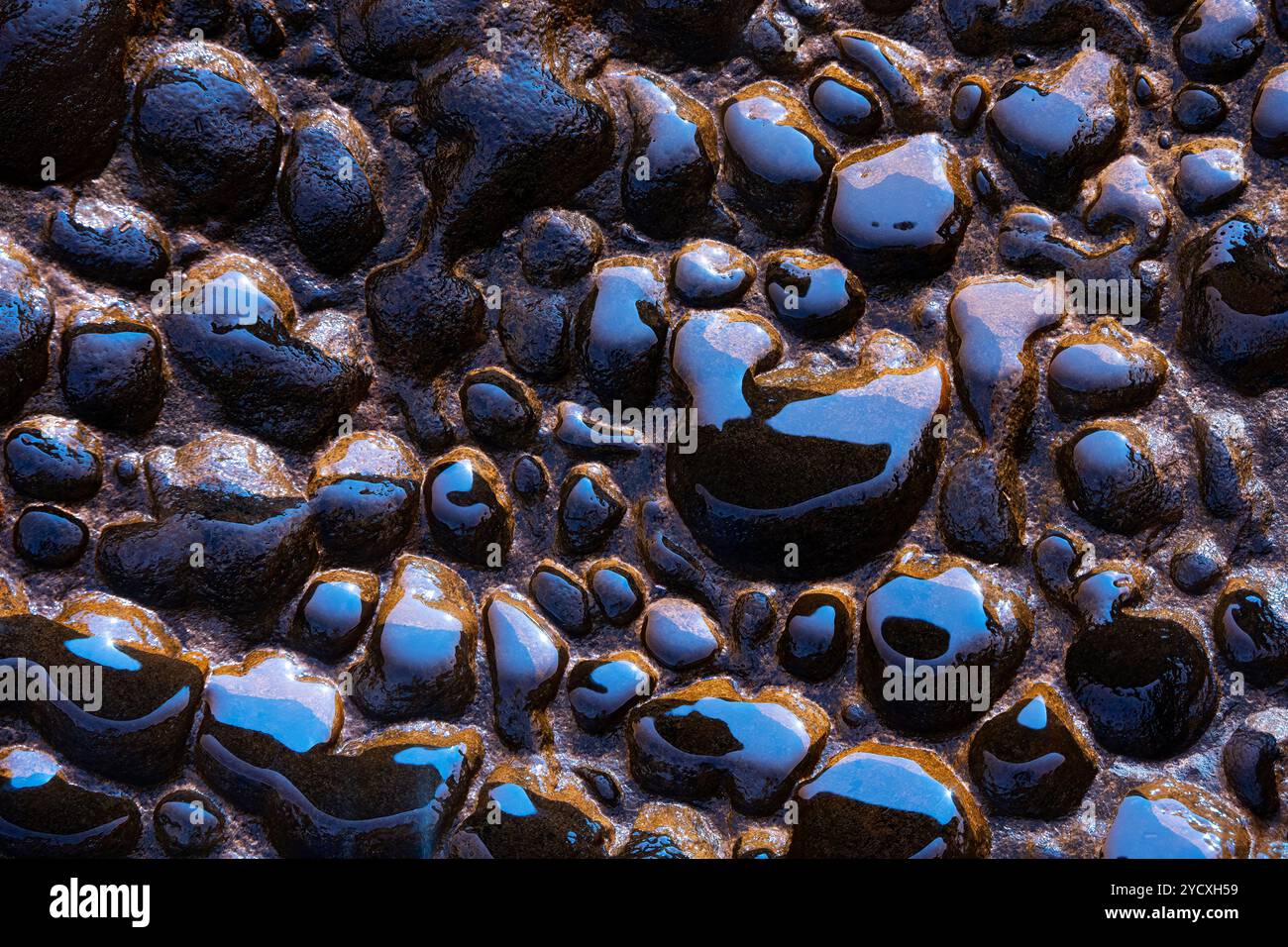 Close-up of water-filled rock formations along the Cantabrian coast in ...