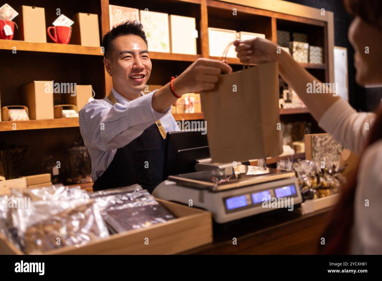 Shop shelves full of sweets hi-res stock photography and images - Alamy