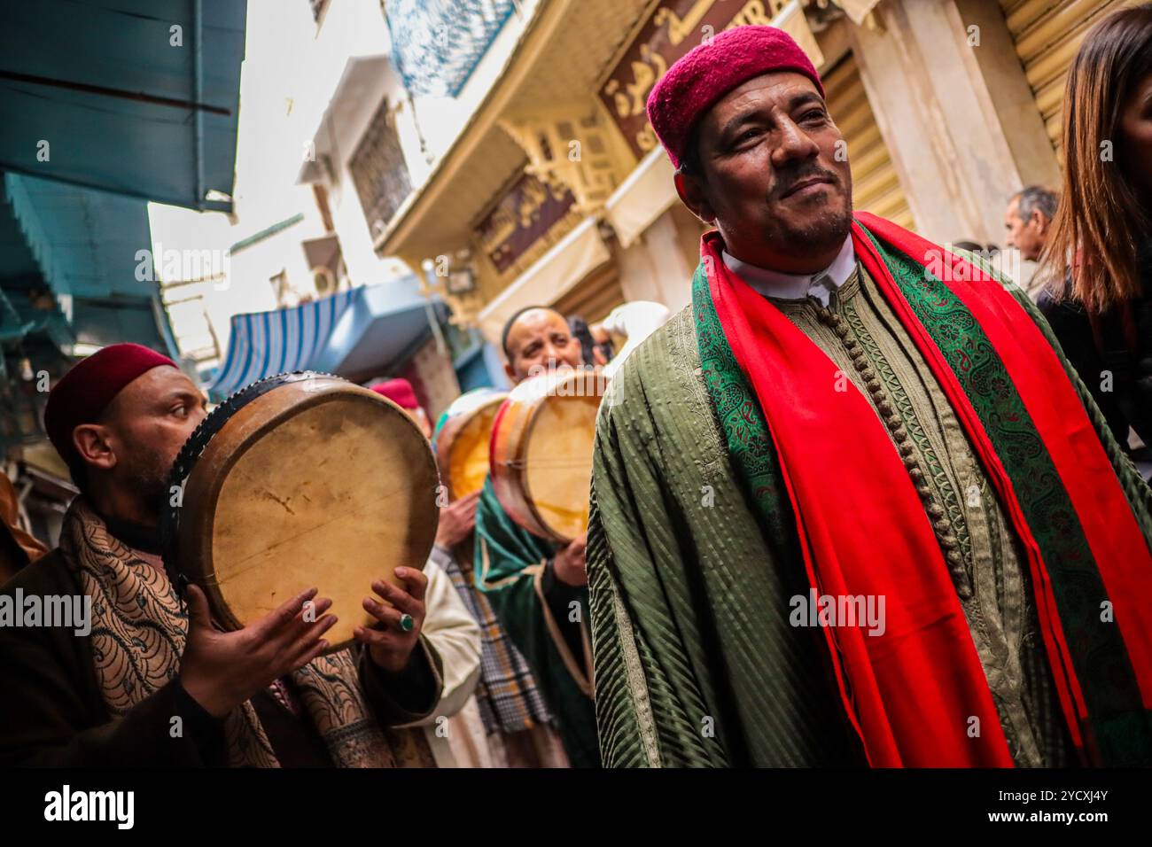 Tunis. Tunisia. 10 March 2024. Tunisian men wear traditional attires and play the drum during a ...