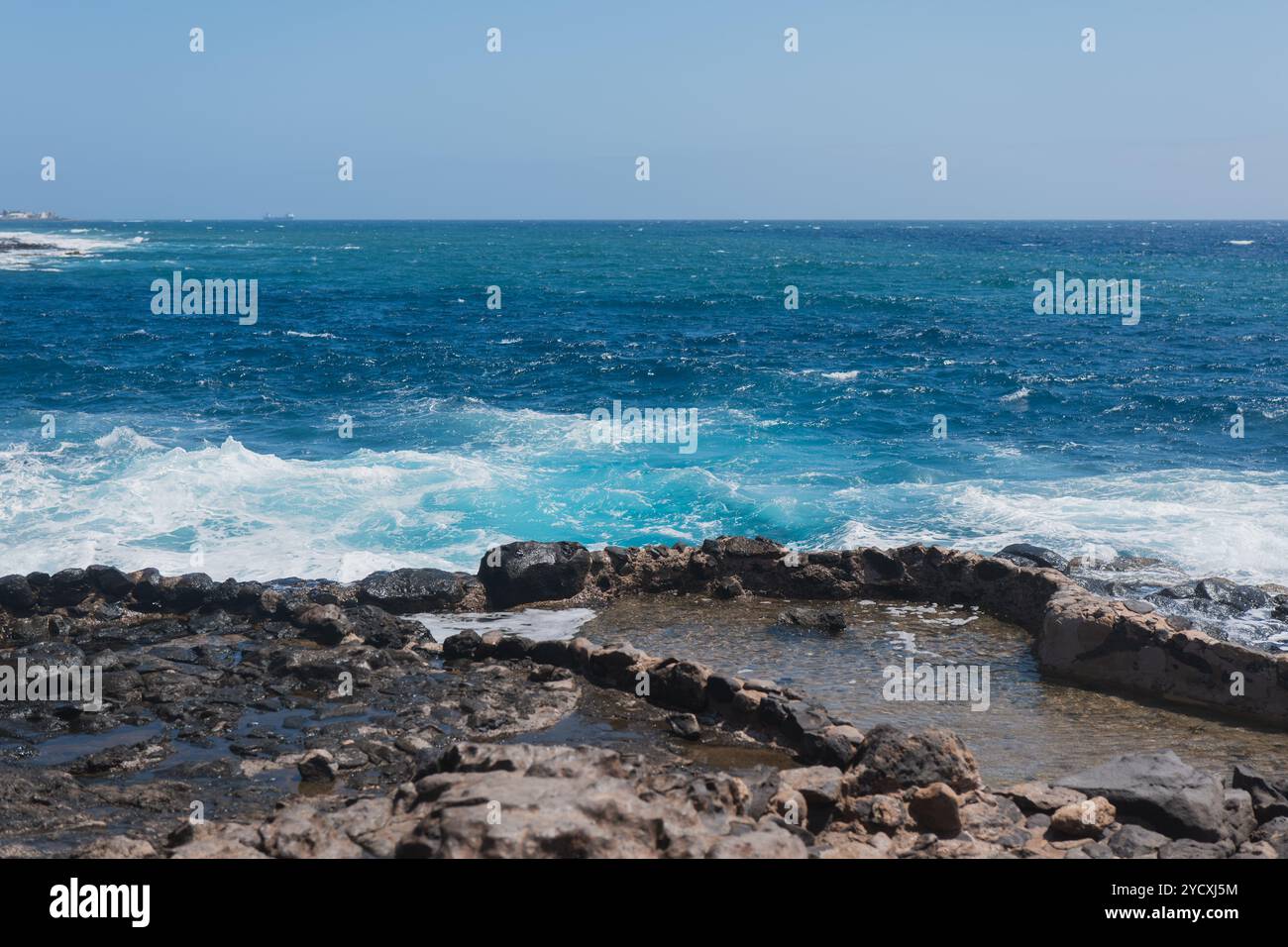 Coastal rock pools filled with sea water, used for natural salt ...
