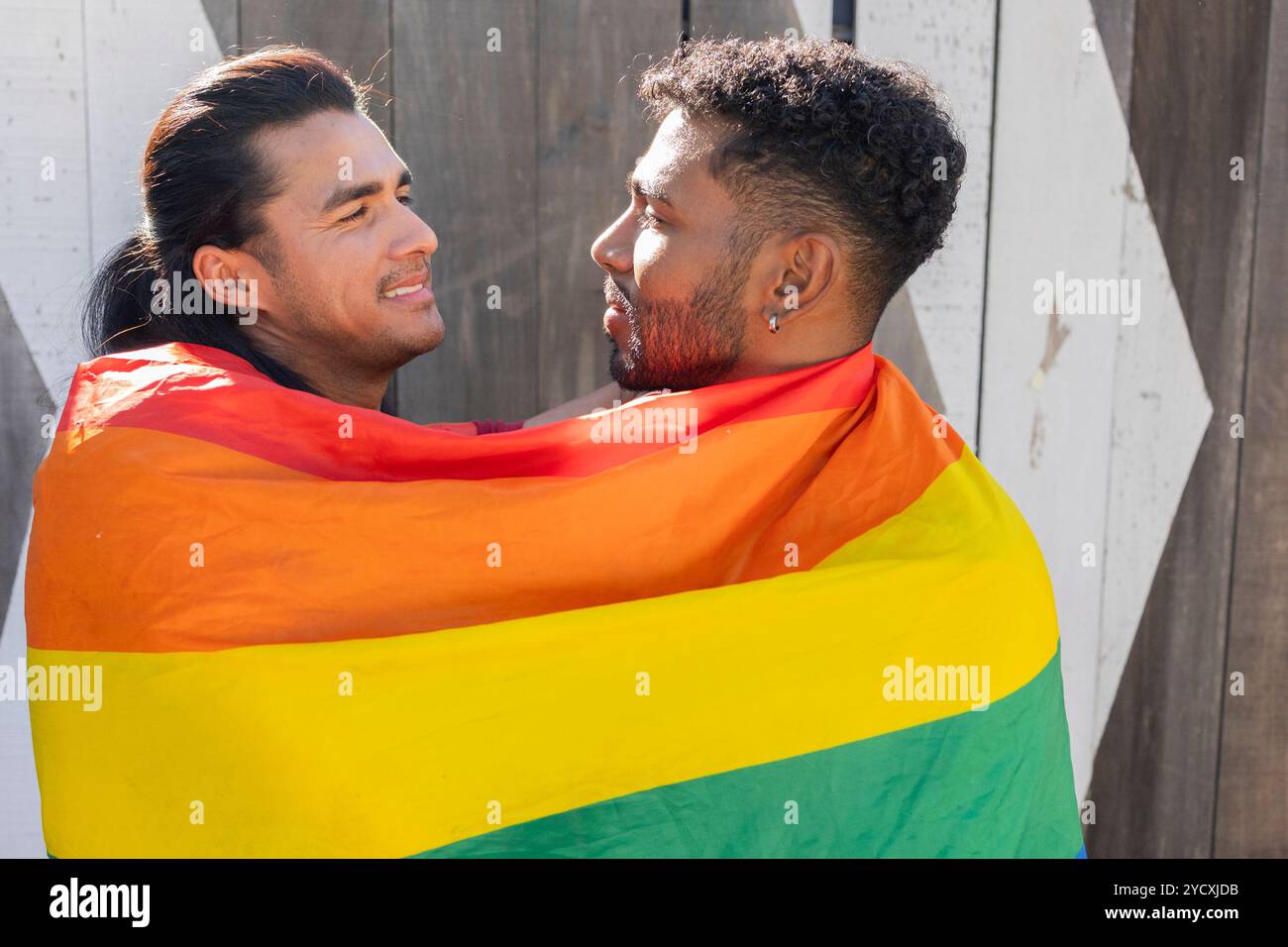 A tender image capturing two gay men, one Latin American and one ...